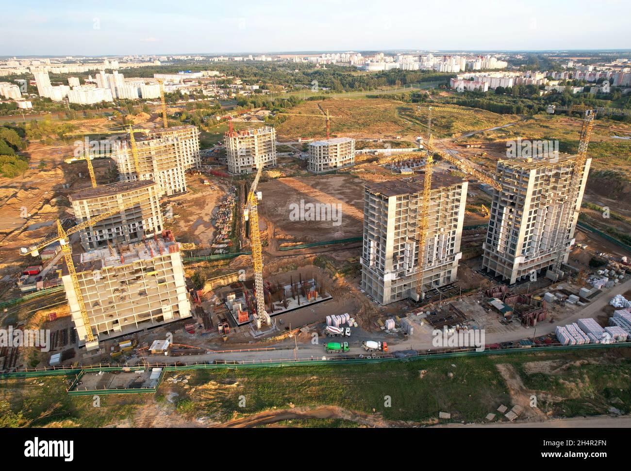 Tower crane working at large construction site. Top view of the the ...