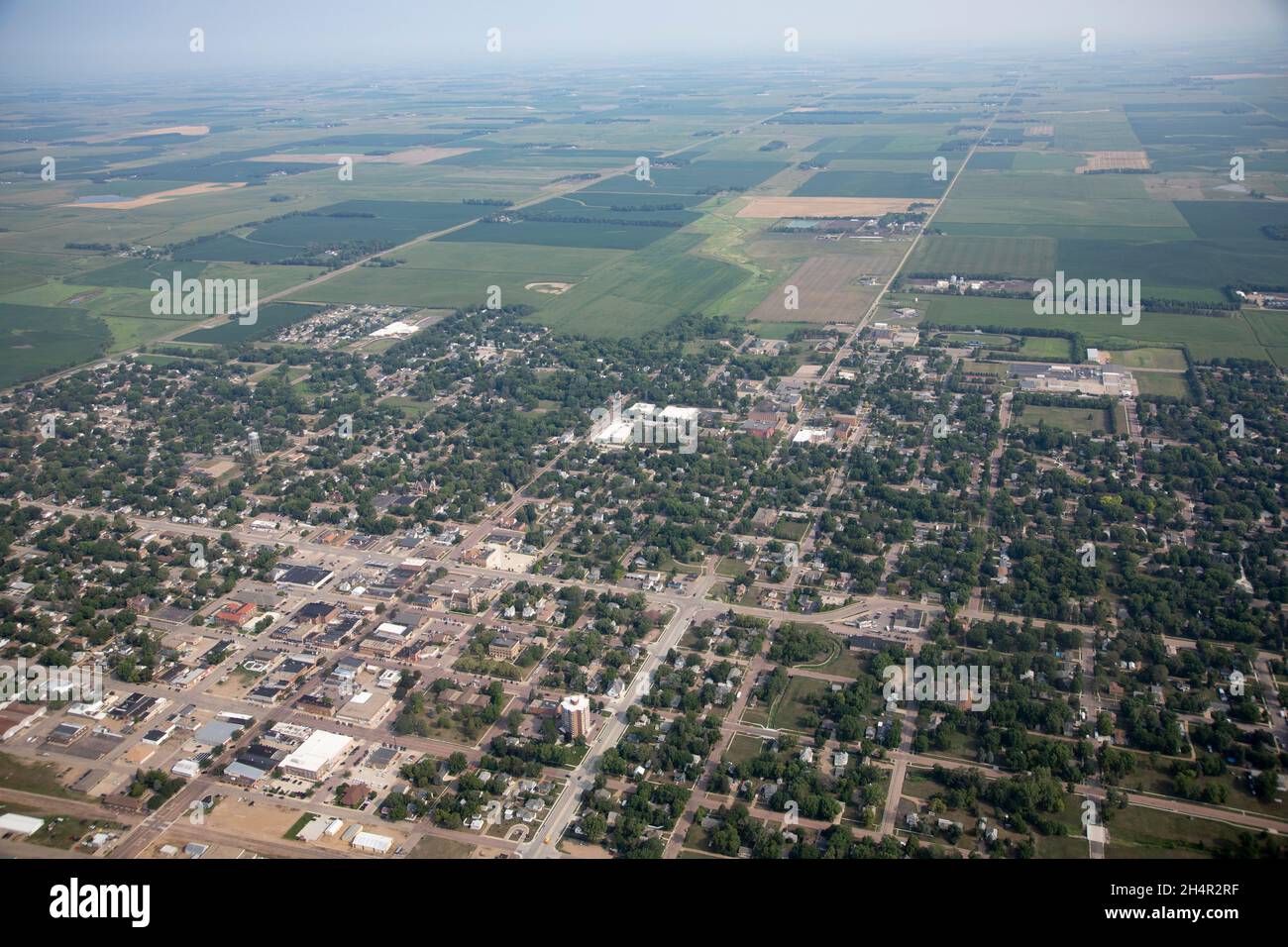 High aerial view of small farming town of Madison, South Dakota with ...