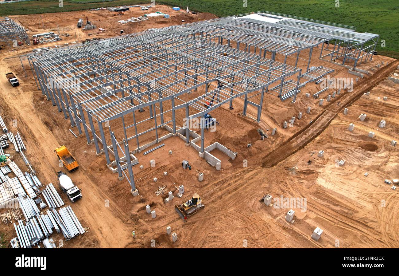 Warehouse Construction from metal structure. Industrial building on ...