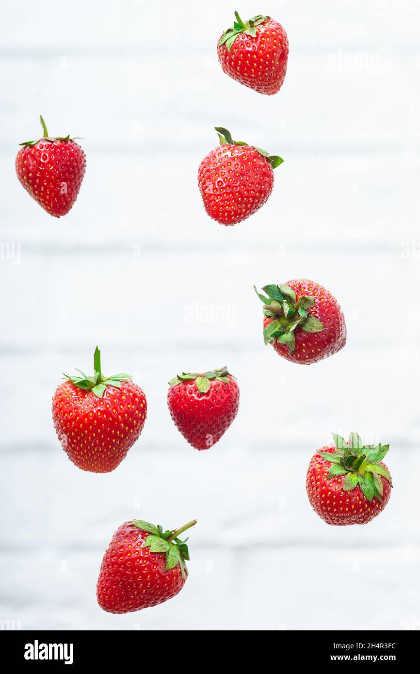 Falling strawberry isolated on white background, selective focus Stock ...