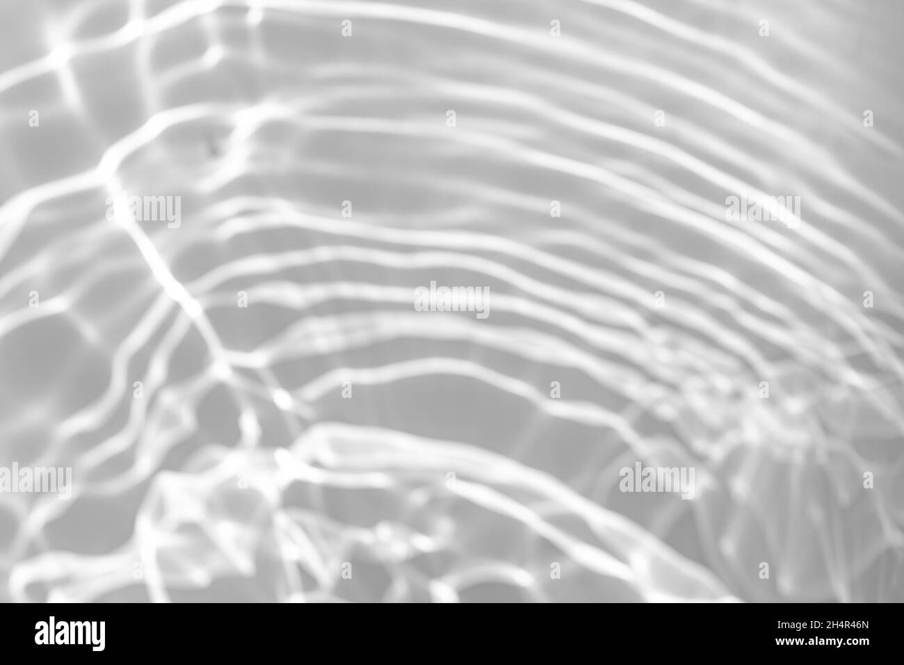 blurred shadow and light caustic effect on a white wall Stock Photo - Alamy