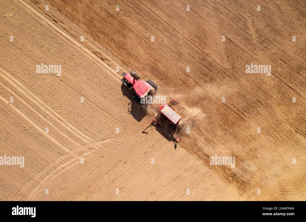 Tractor sowing seed onto field hi-res stock photography and images - Alamy