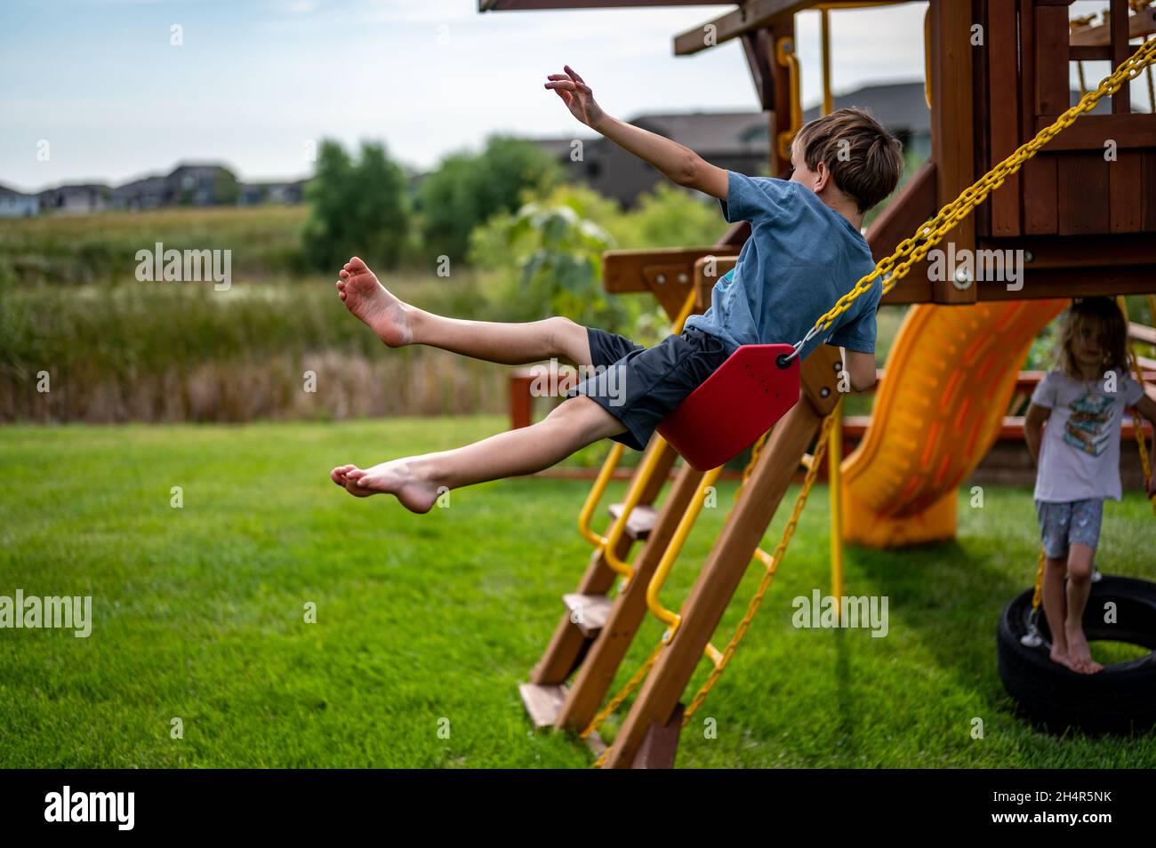 Swing high in air hi-res stock photography and images - Alamy