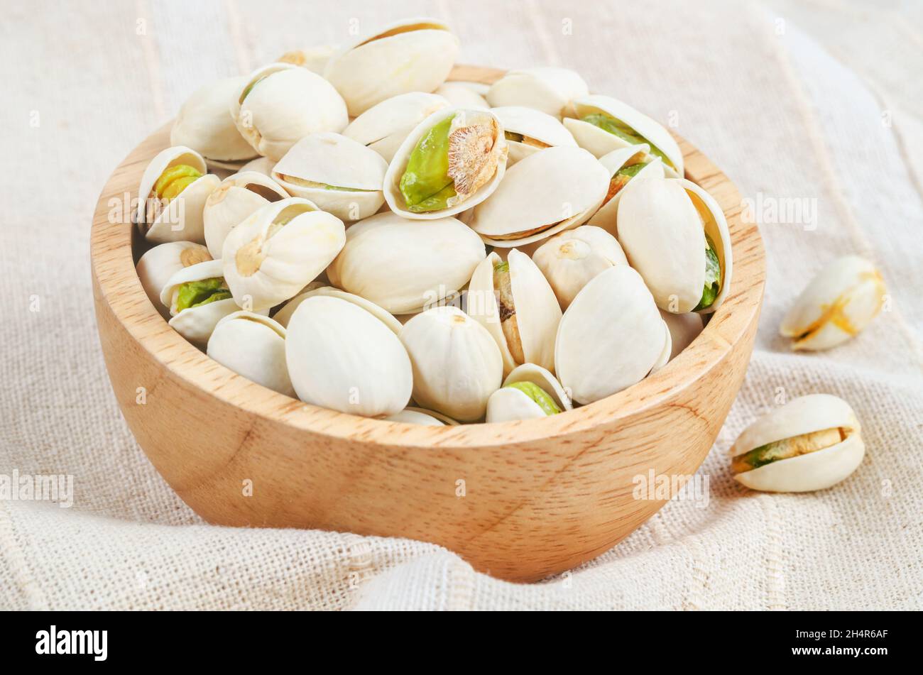 Unpeeled pistachio nuts in hi-res stock photography and images - Alamy