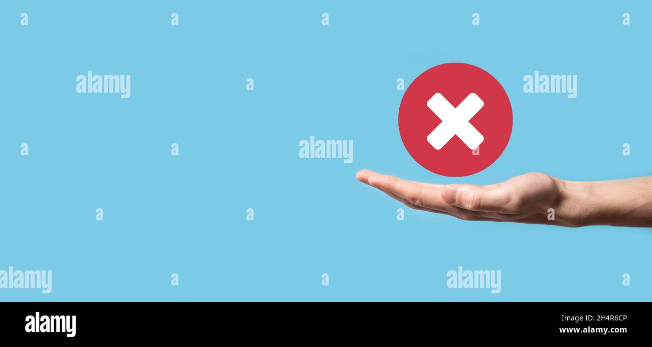 Hand holds icon,cancellation symbol,cancel icon.Cross mark flat red ...