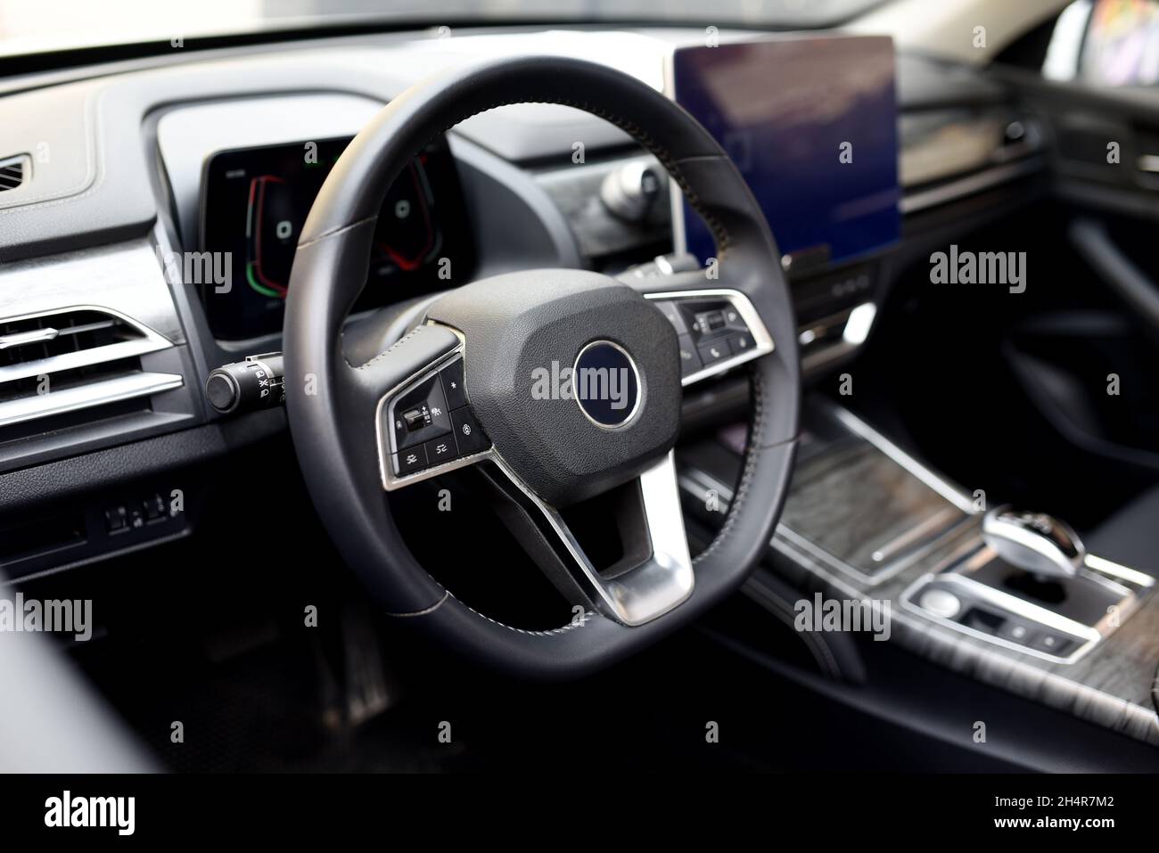 Steering wheel of an electric modern car. Car interior. Driver's seat ...