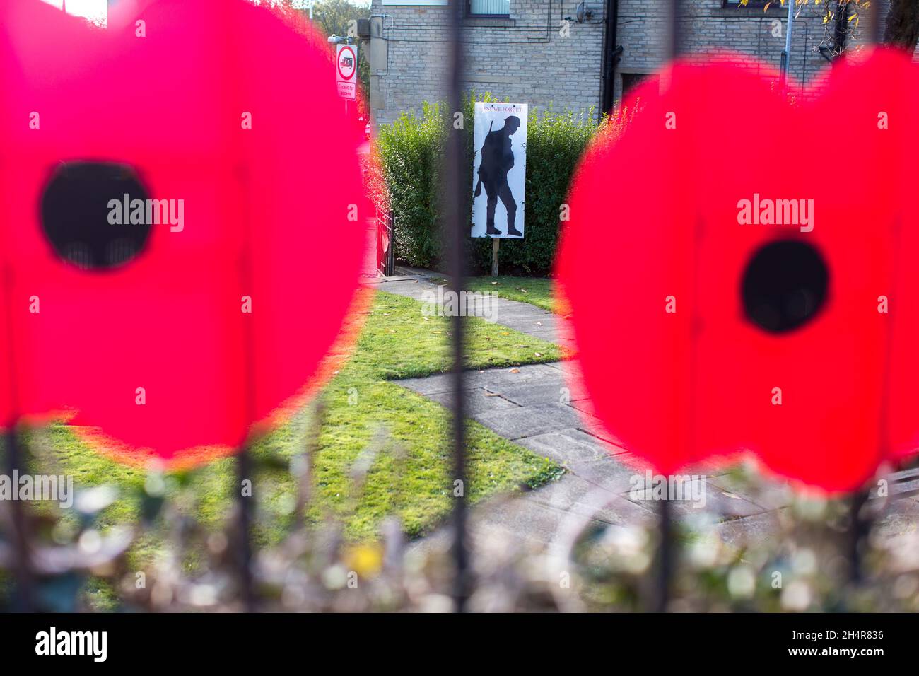 Poppy Day memorials at the war memorial in Shelf, West Yorkshire ...