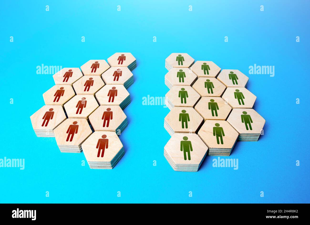 The group of people is divided equally on the issue. Two camps of ...