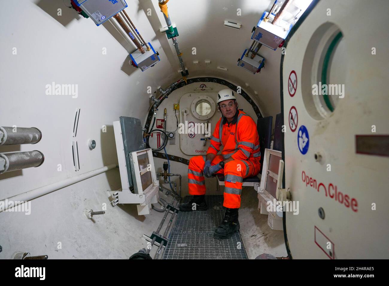 A Worker sits in the compression chamber on one of the two tunnelling ...
