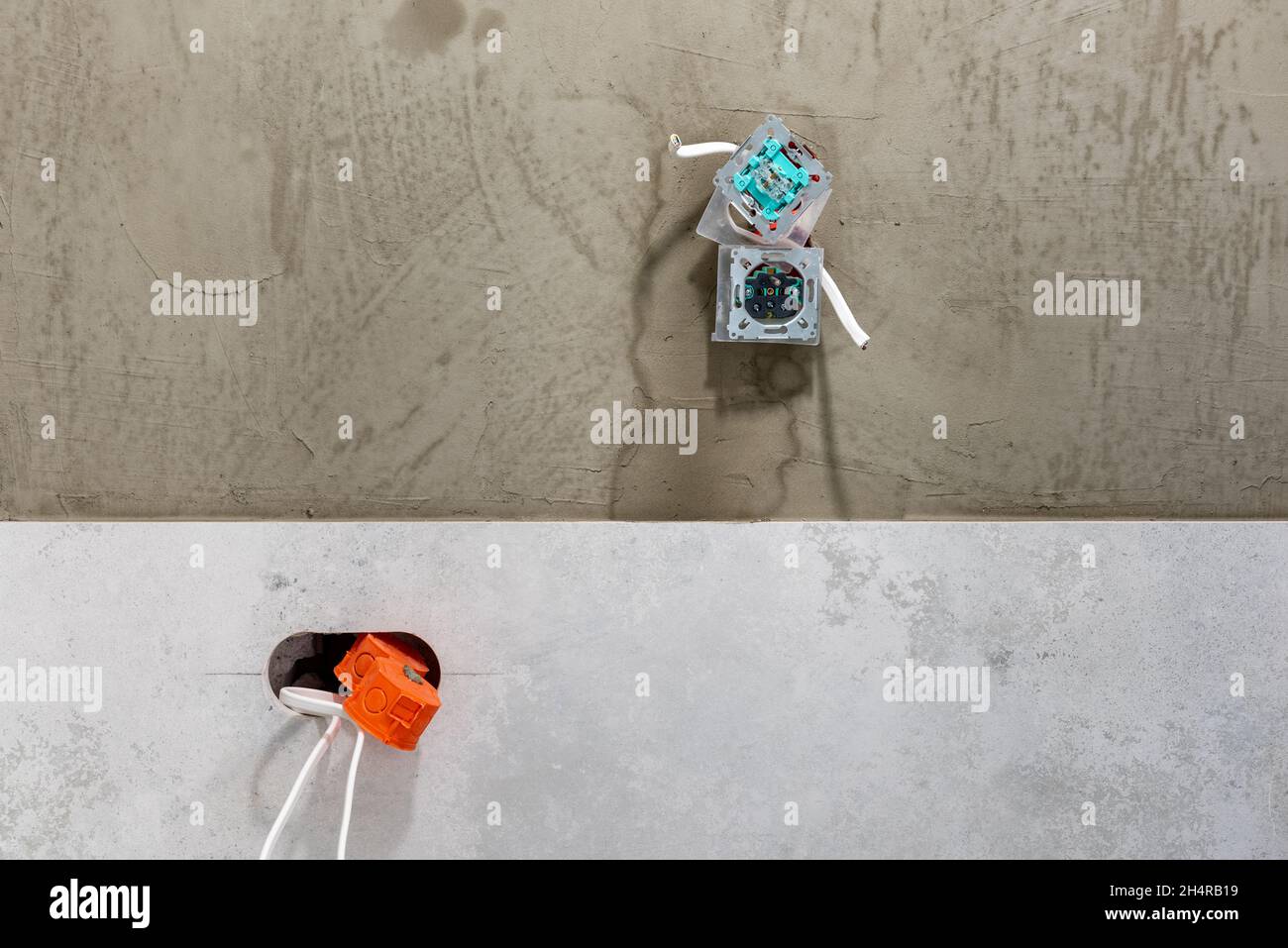 Electrical installation, plastic boxes and cables for wall sockets ...