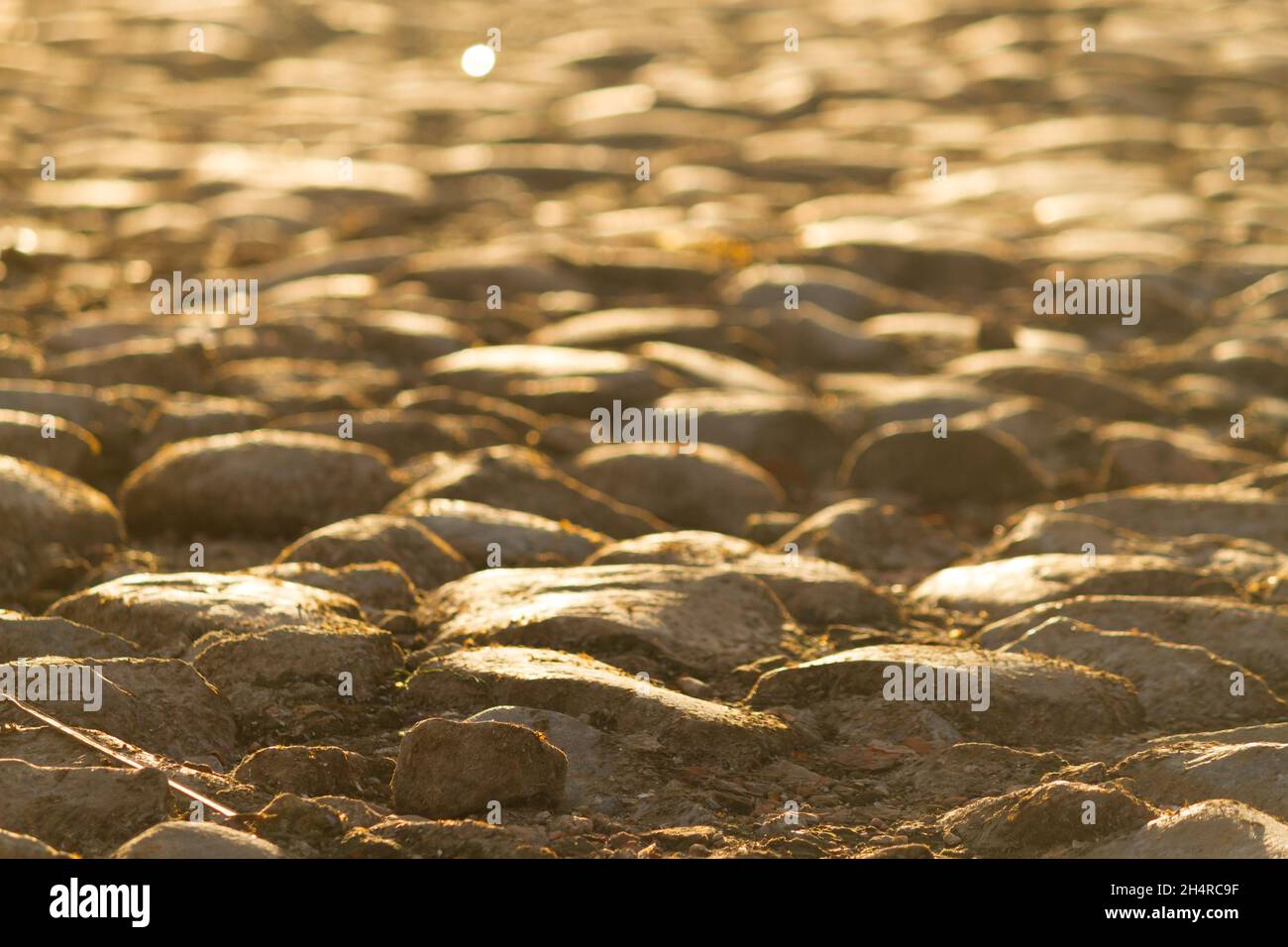 Old stone block road pavement Stock Photo - Alamy