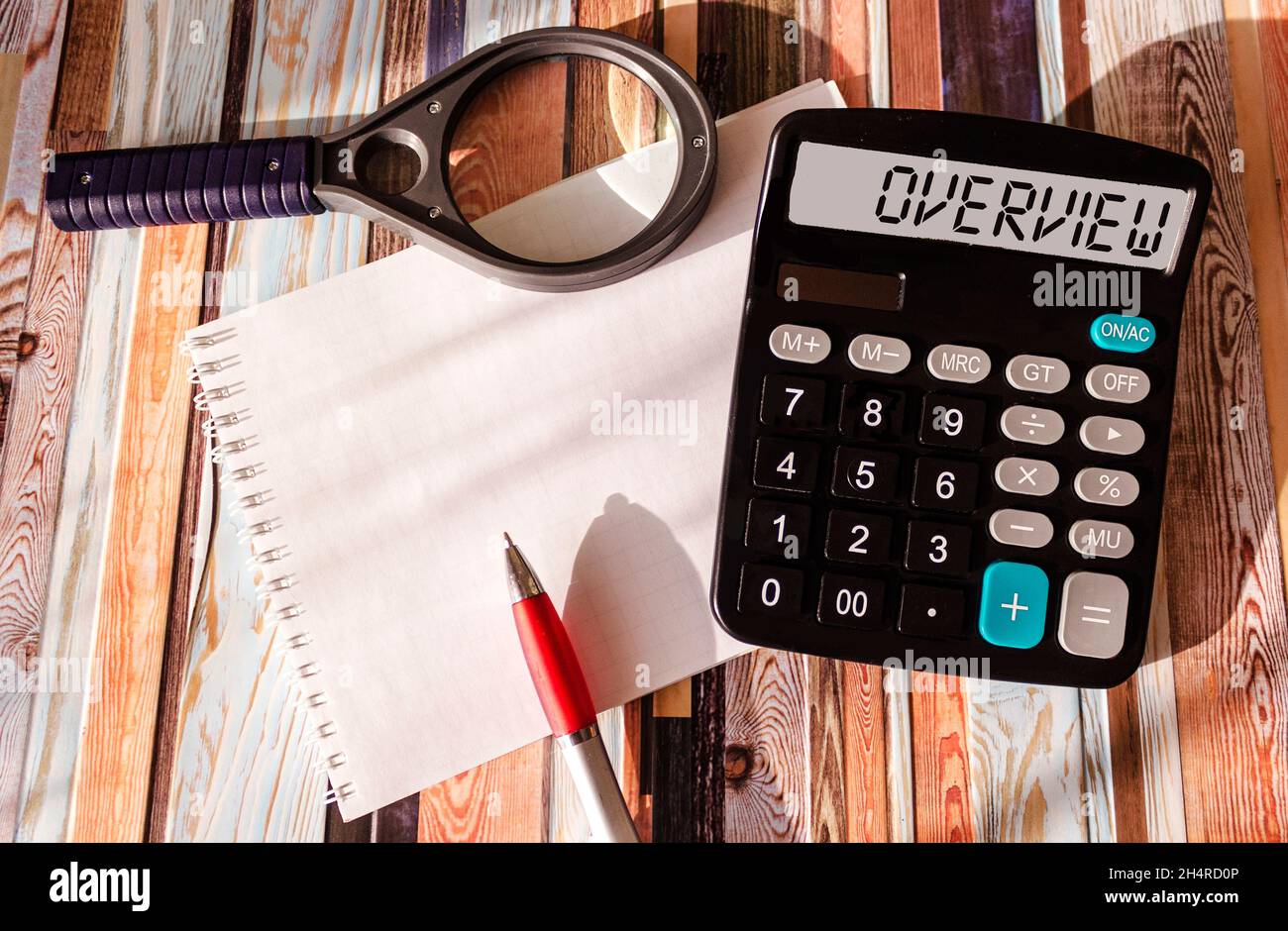 OVERVIEW Calculator on table with Office Supplies. ipad Stock Photo - Alamy