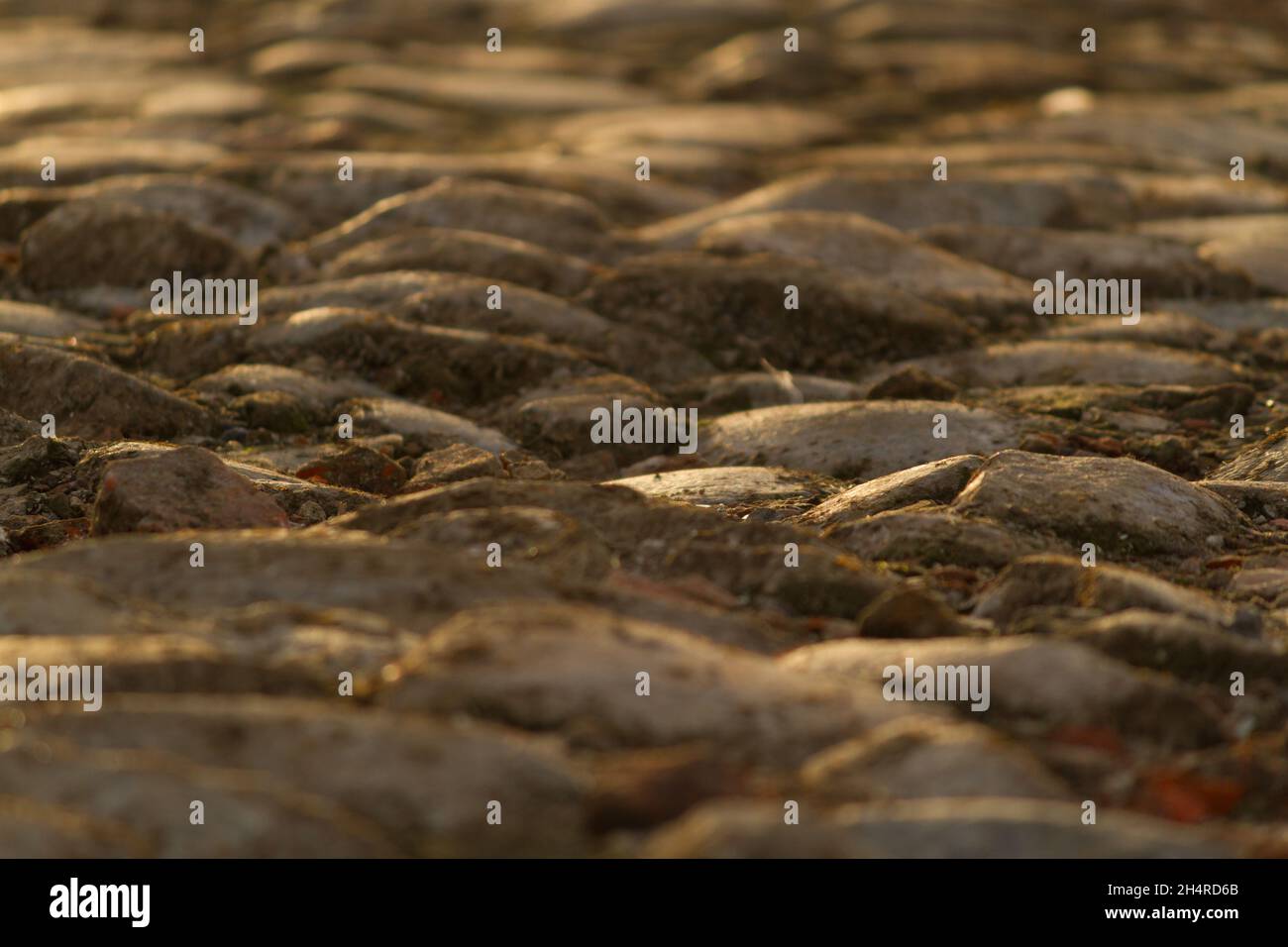 Old stone block road pavement Stock Photo - Alamy