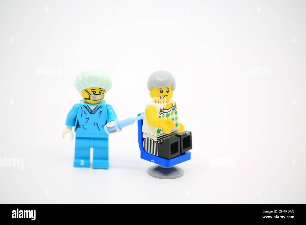e nurse give vaccine to people. Lego minifigure are the successful line ...