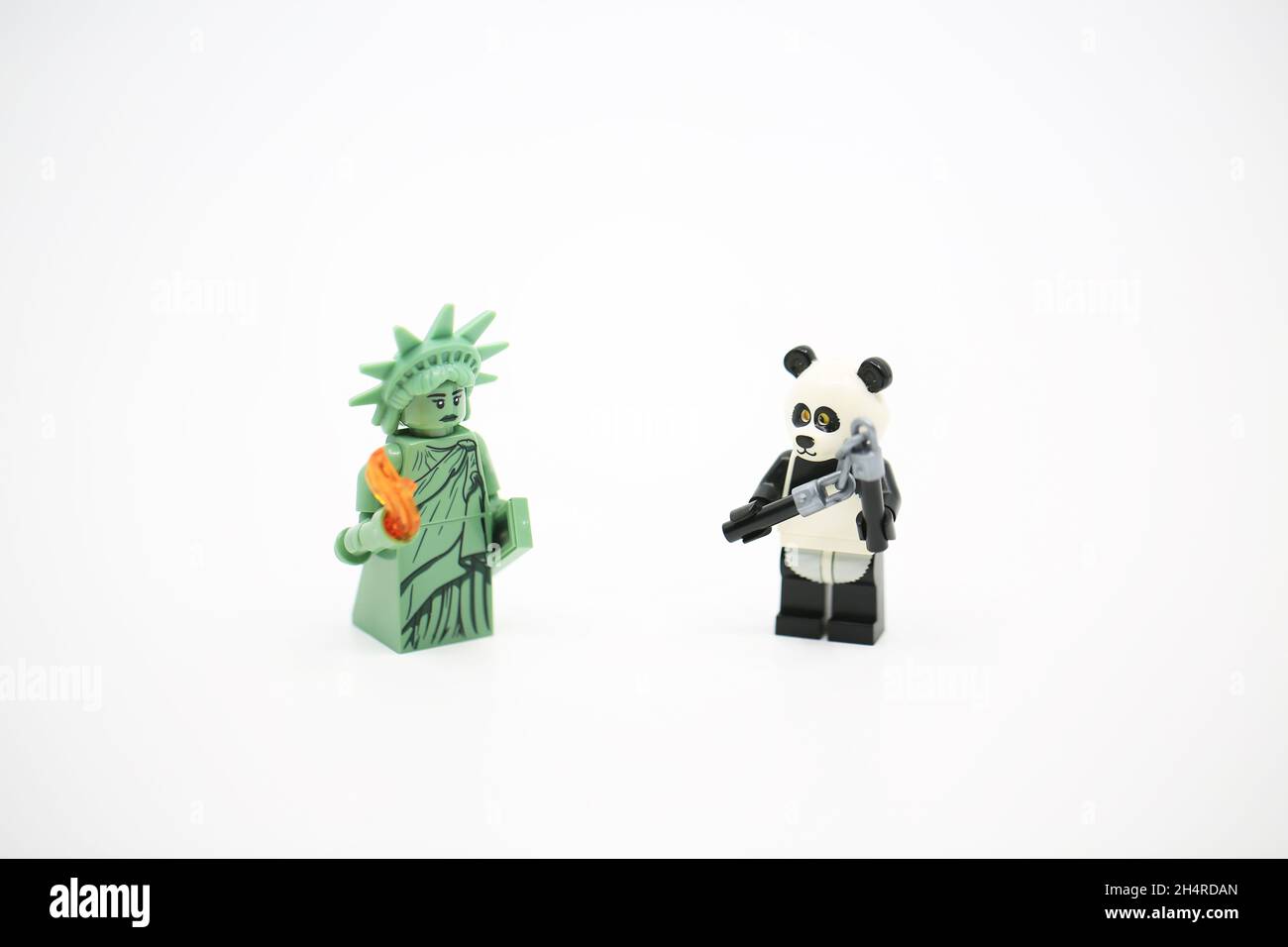 Hong Kong -October 2 2021 . status of liberty and panda dressing man ...
