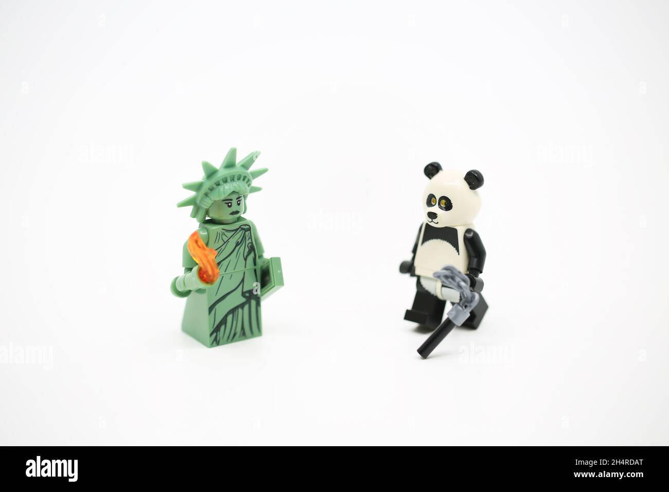Hong Kong -October 2 2021 . status of liberty and panda dressing man ...