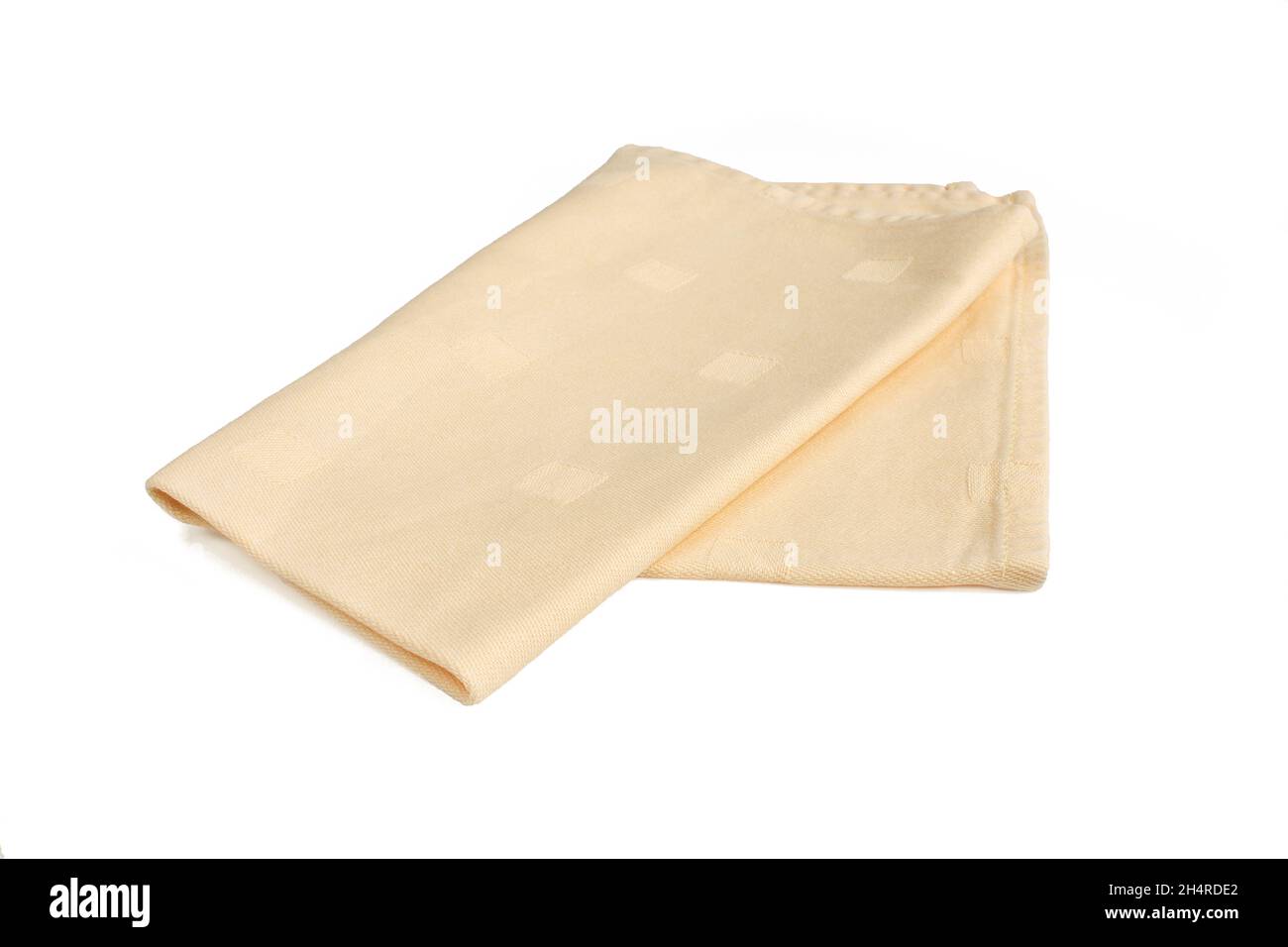 Orange folded napkin isolated on white background Stock Photo - Alamy