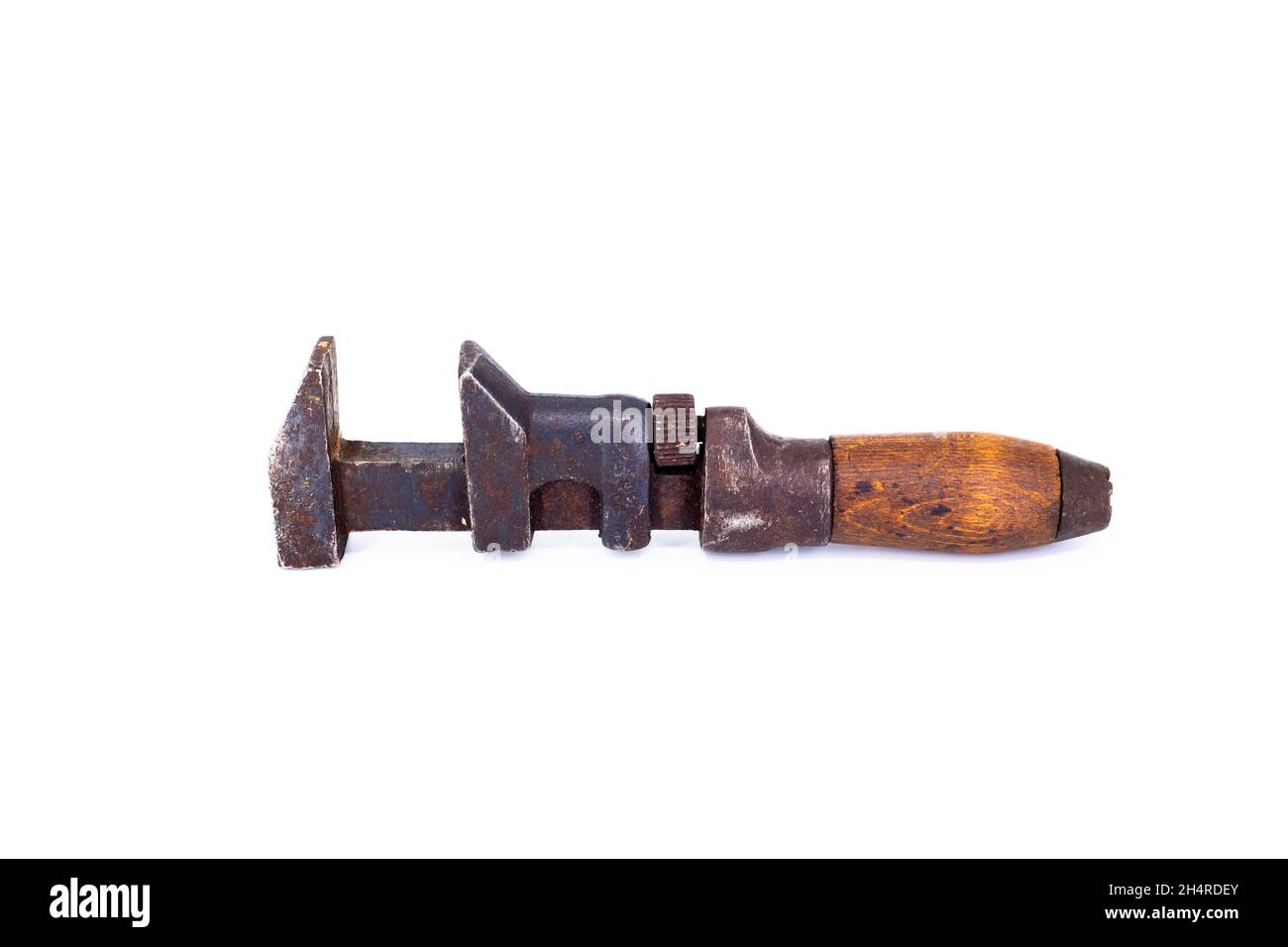 Vintage antique rusty plumber monkey wrench with a wooden handle ...