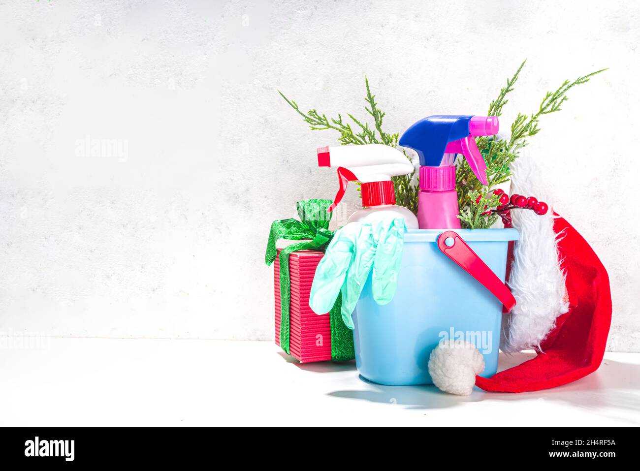 Christmas cleaning concept. Various bottles, equipment, and accessories ...