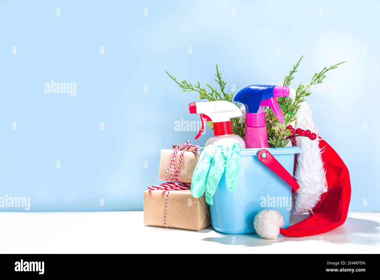 Christmas cleaning concept. Various bottles, equipment, and accessories ...