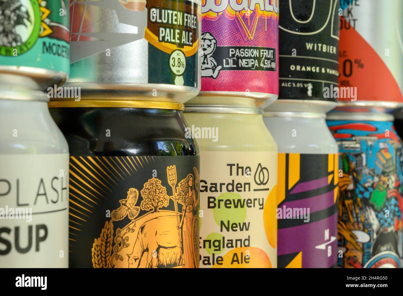 Closeup display of stacked craft beer cans by different breweries from ...