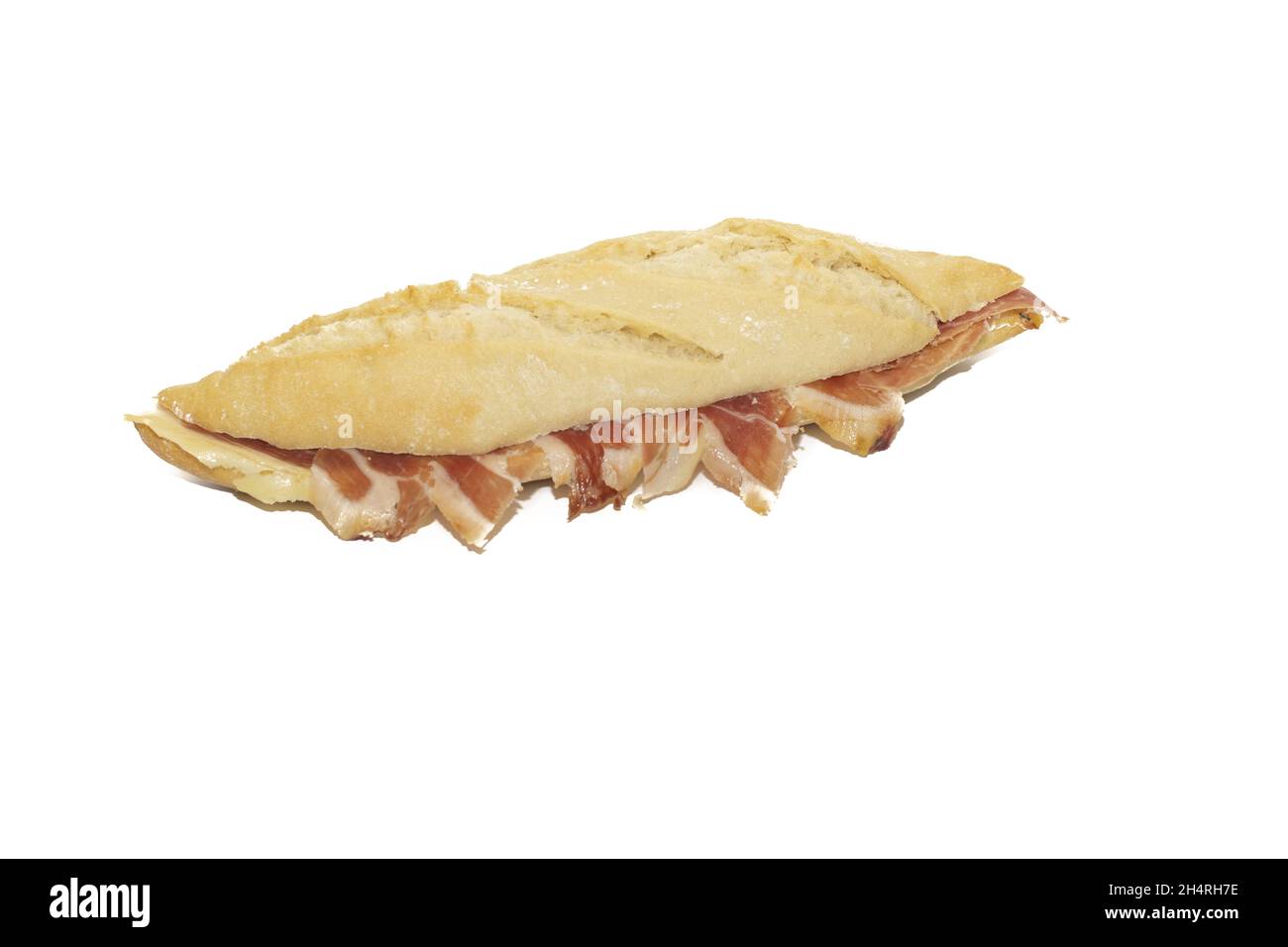 Traditional Spanish bocadillo ham sandwich with a crusty bread isolated ...