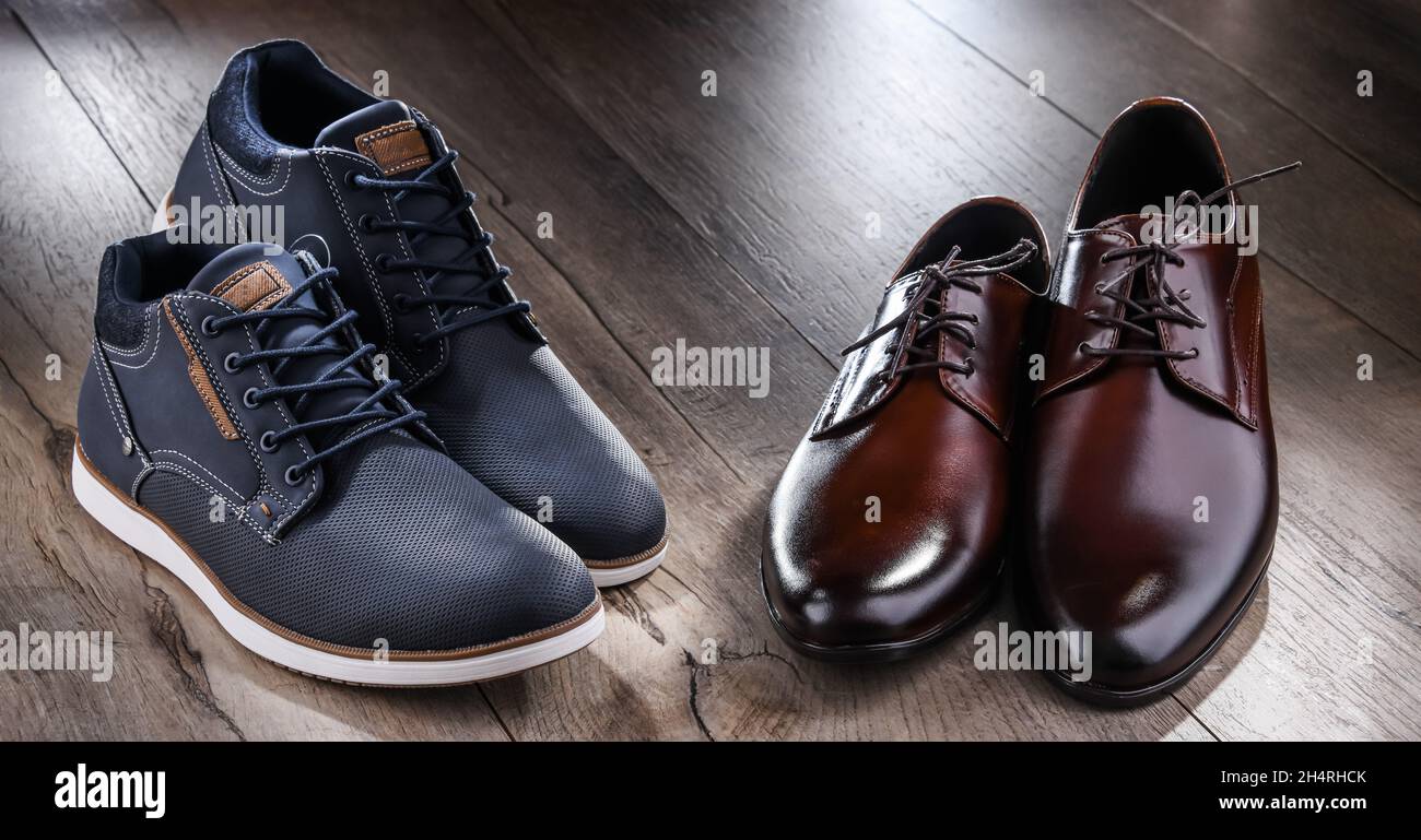Composition with two pairs of men's shoes Stock Photo - Alamy