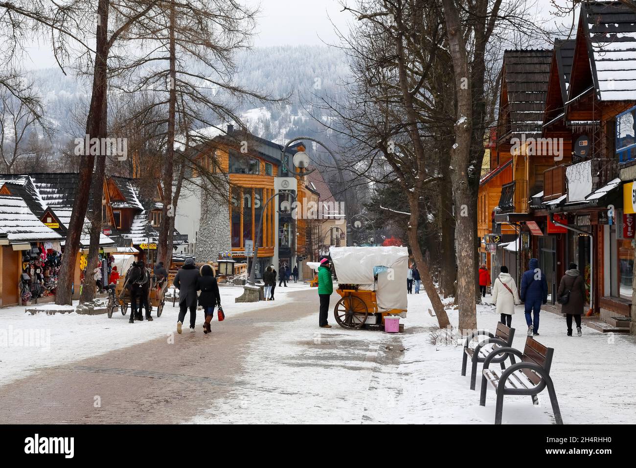 Zakopane, Poland - March 19, 2018: Along Krupowki Street several people ...