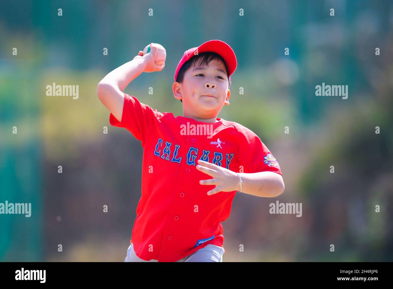 Girl in baseball uniform hi-res stock photography and images - Alamy