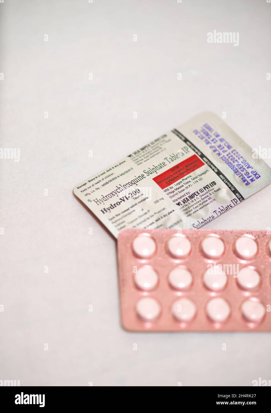 Hydroxychloroquine pills generic Plaquent on white background, vertical ...