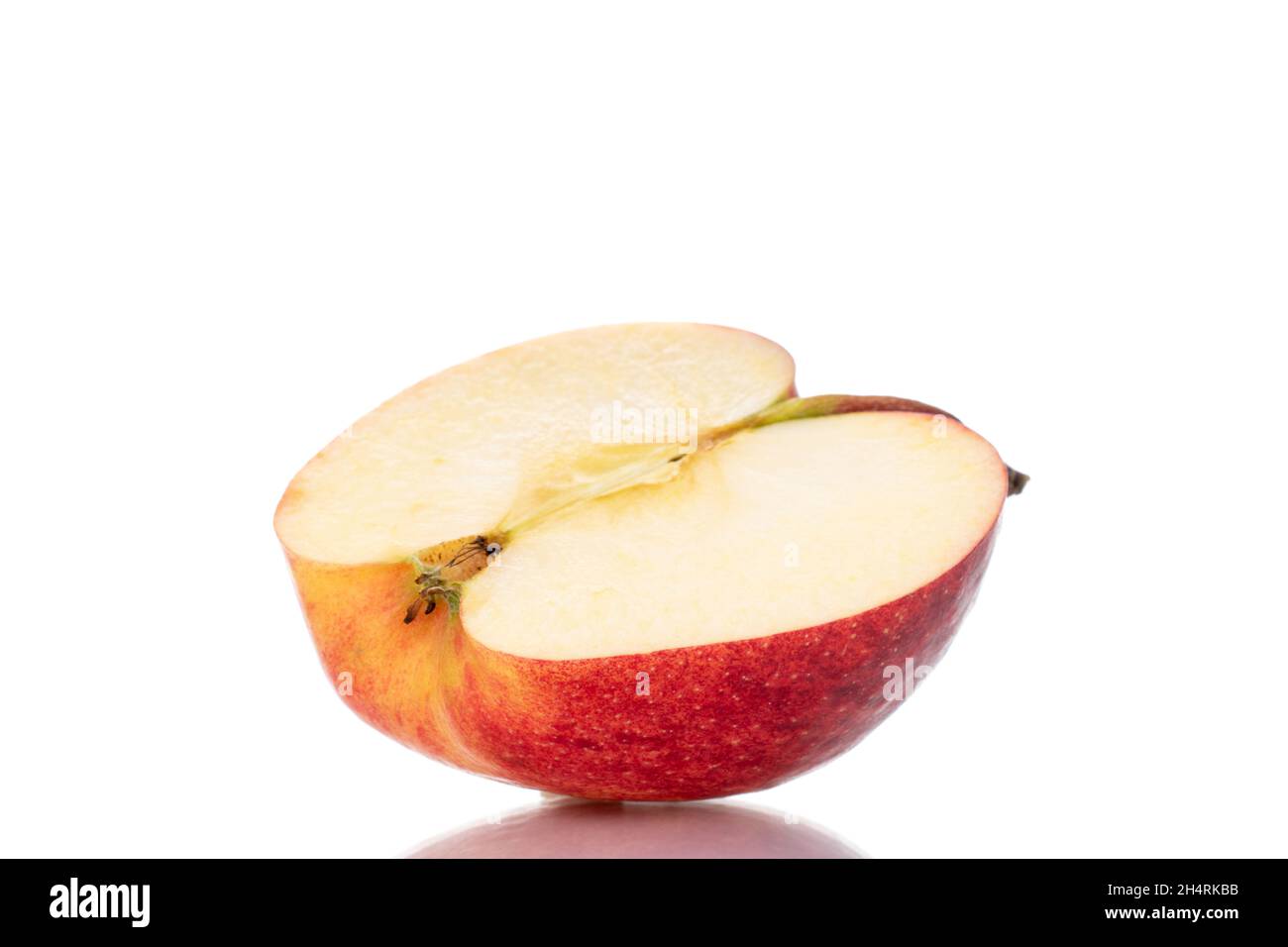 One half of a sweet juicy apple, close-up, isolated on white Stock ...