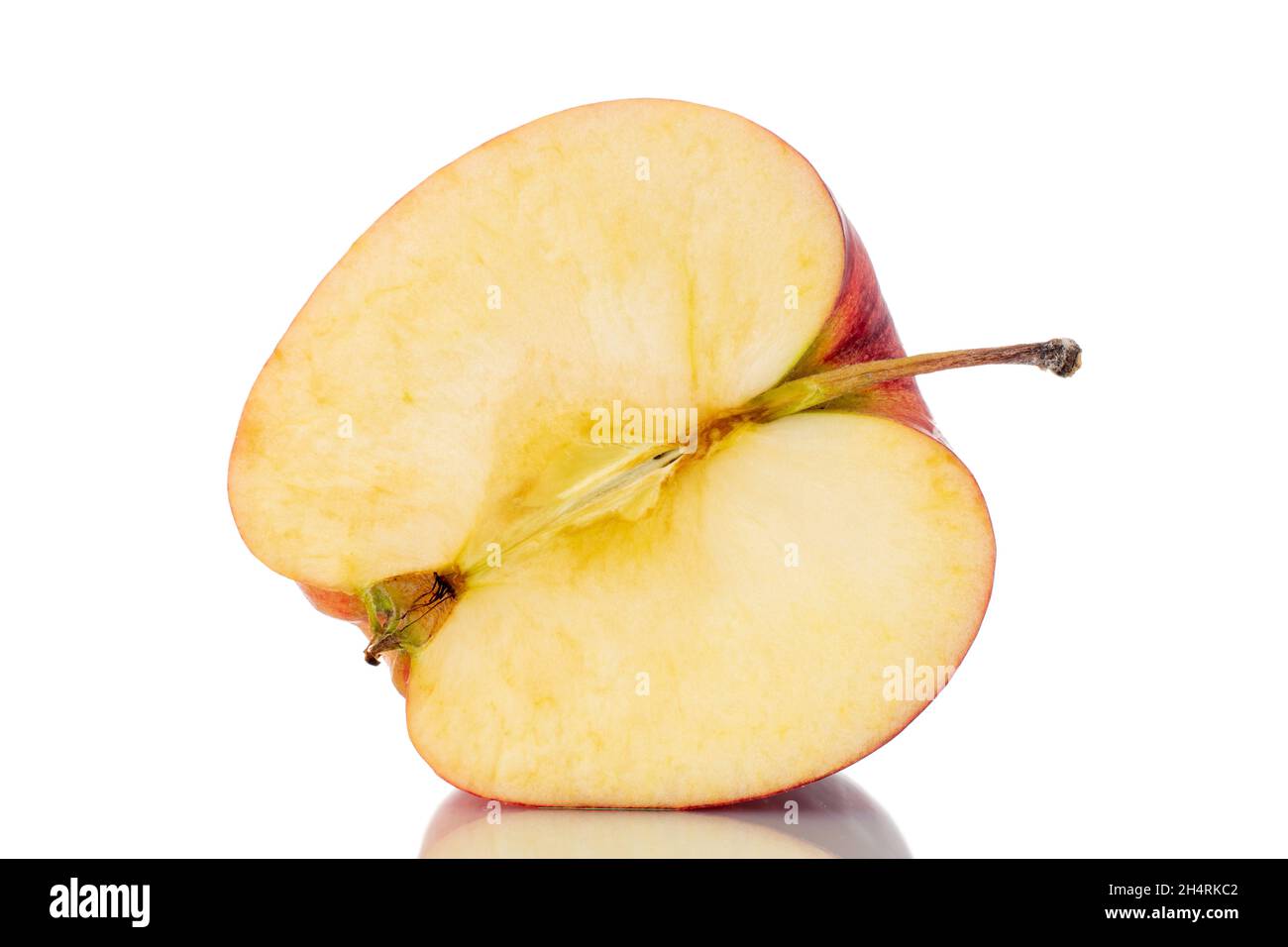 One half of a sweet juicy apple, close-up, isolated on white Stock ...