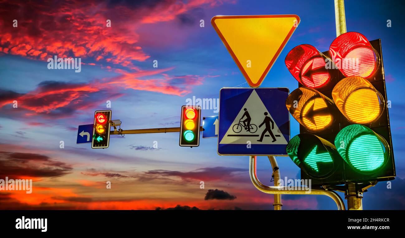 Traffic lights over urban intersection Stock Photo - Alamy