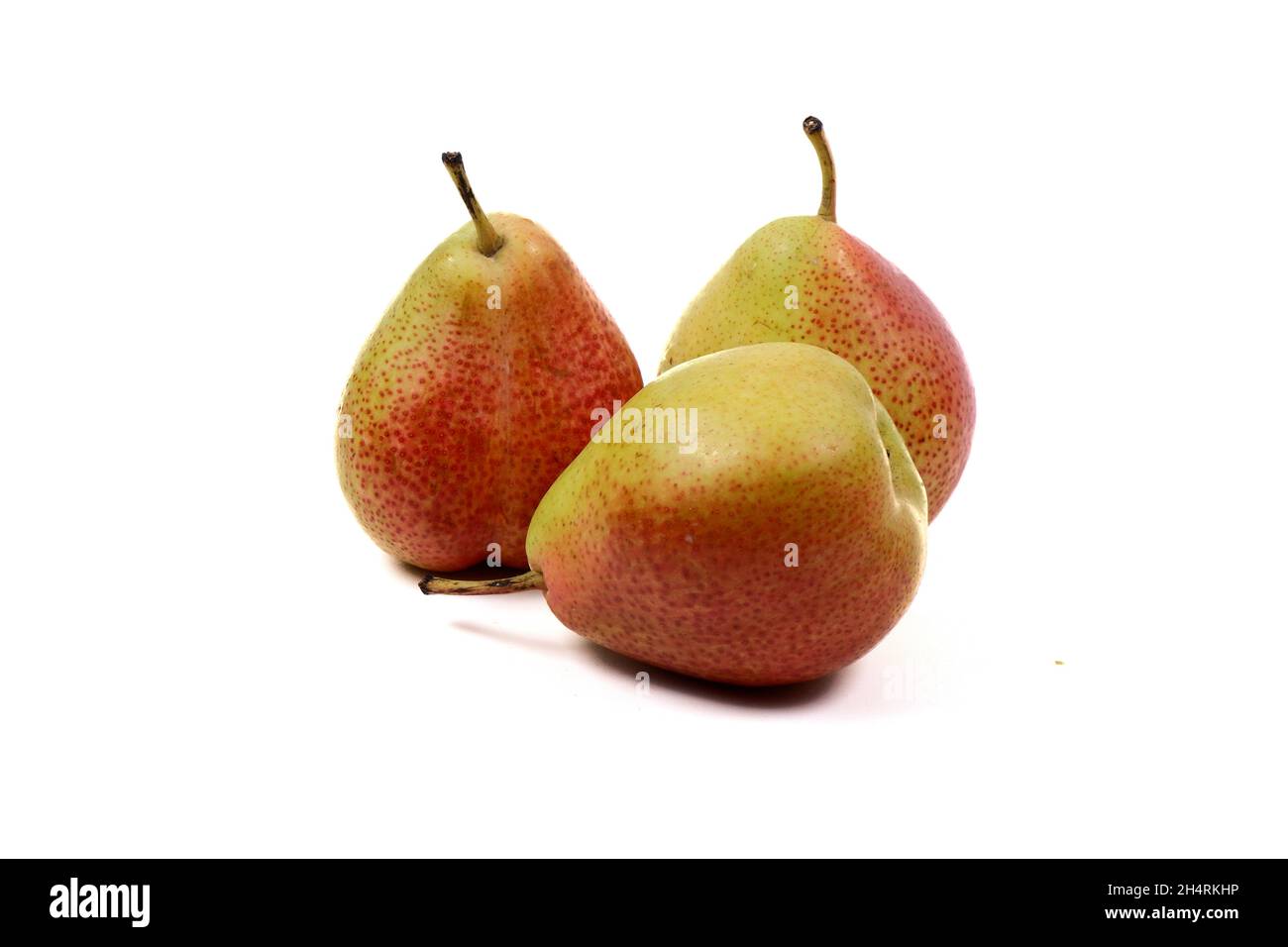 three pears isolated on a white background Stock Photo - Alamy