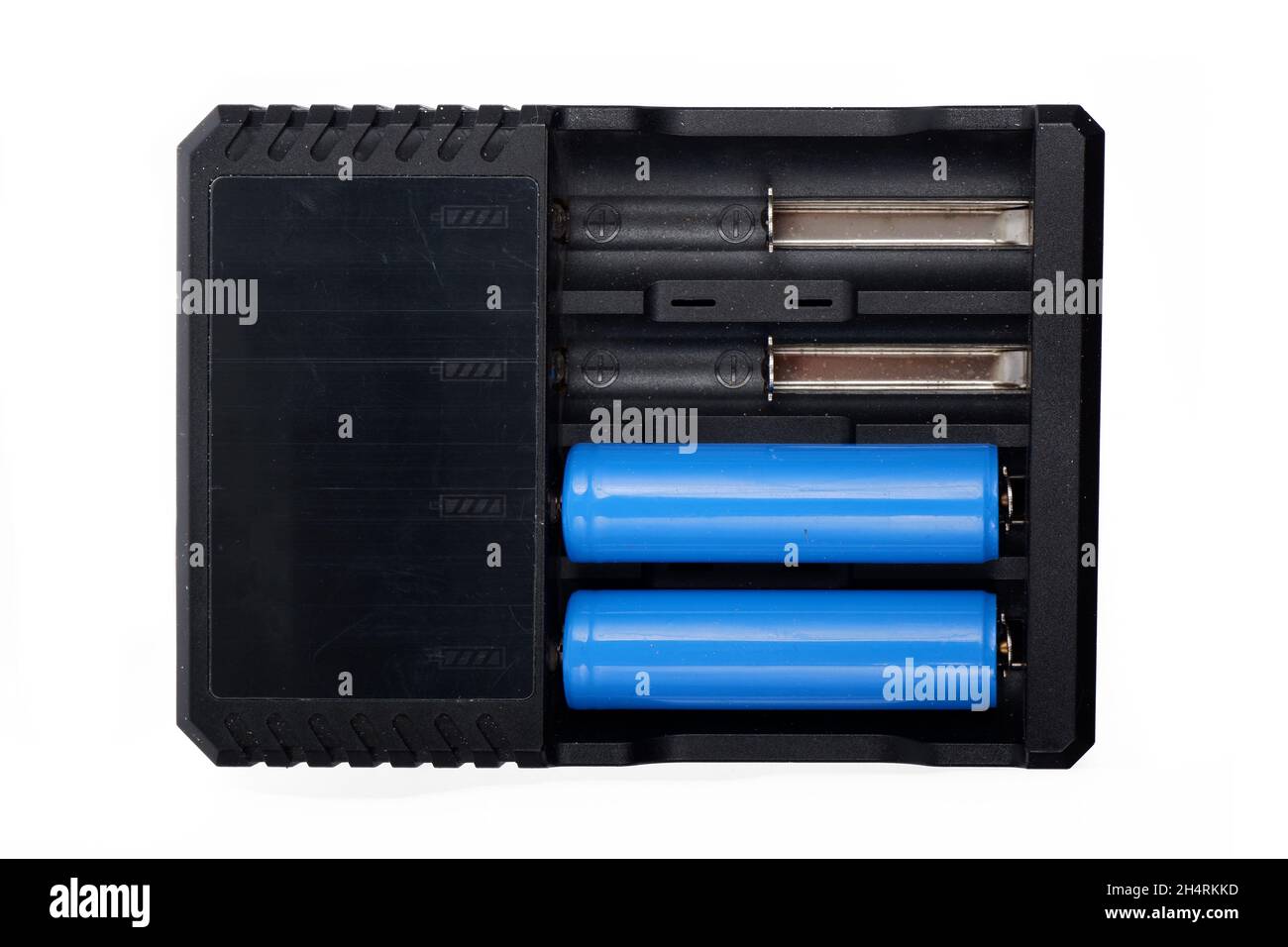battery charger, with two batteries in it, isolated on a white ...