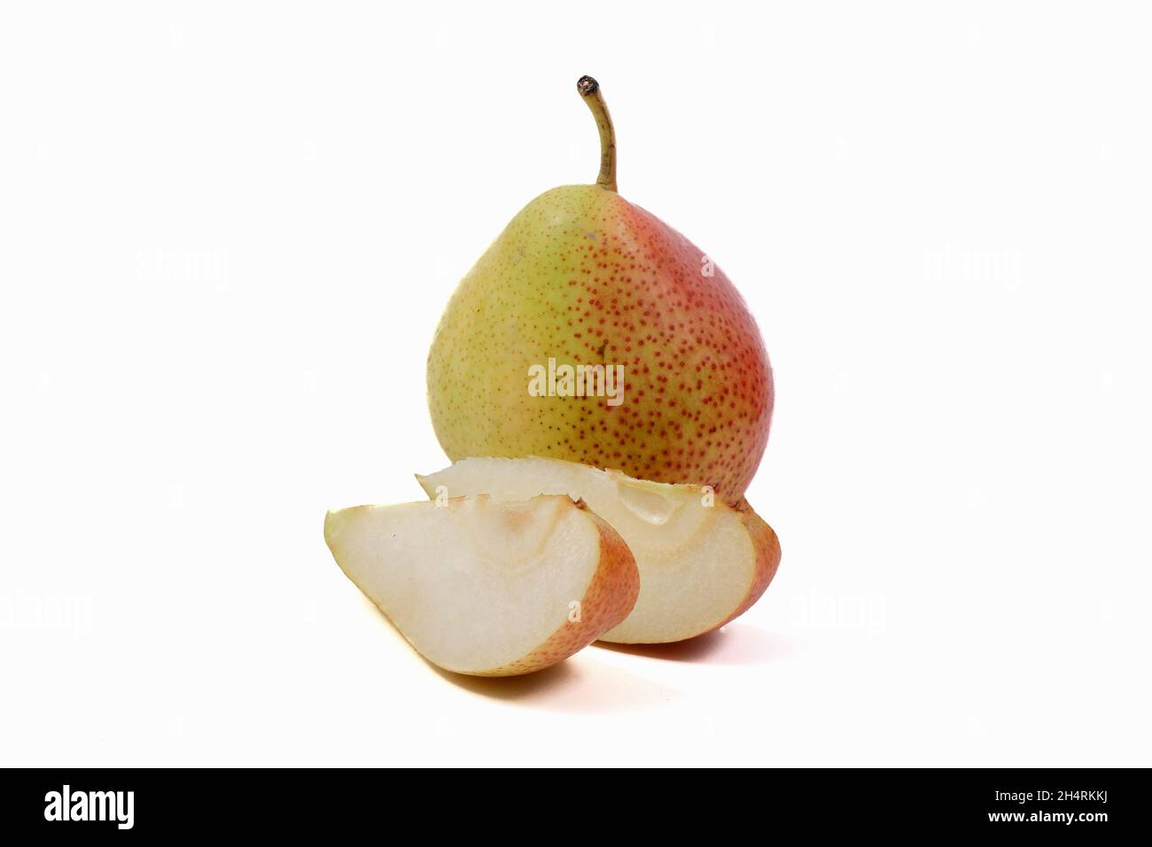 pear and pear pieces side by side, isolated on a white background Stock ...