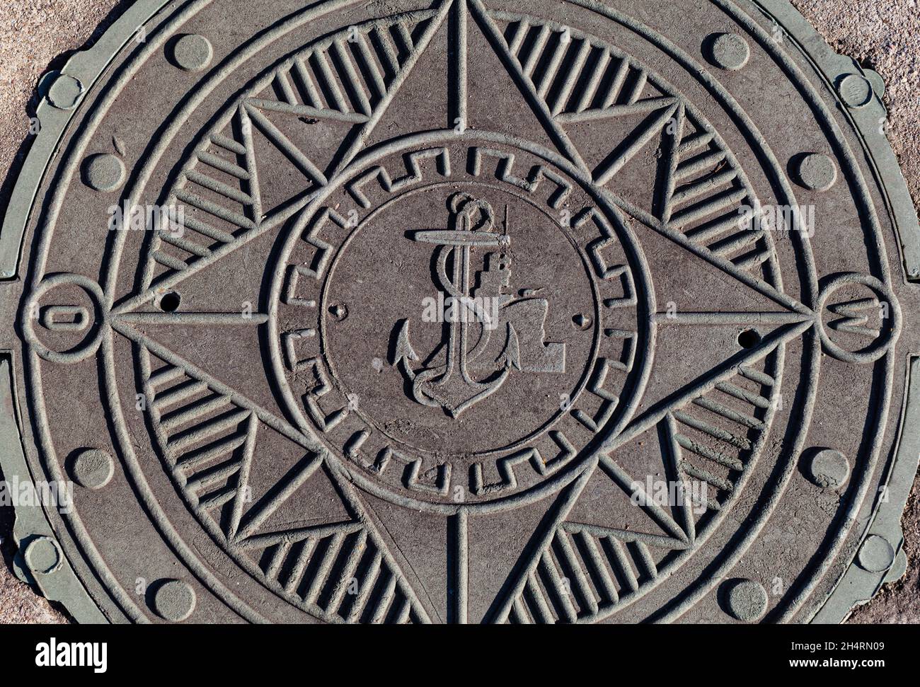well manhole made of stone with an anchor image Stock Photo - Alamy