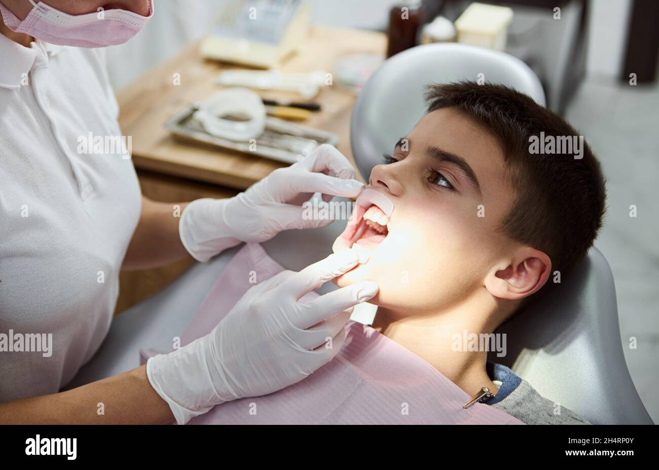 Dental cheek retractor hi-res stock photography and images - Alamy