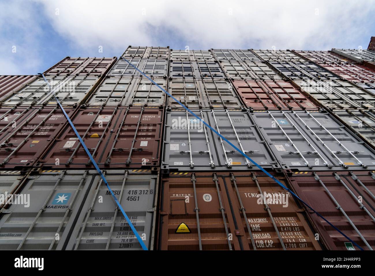 Large stack of shipping containers being stored off dock in Eye ...