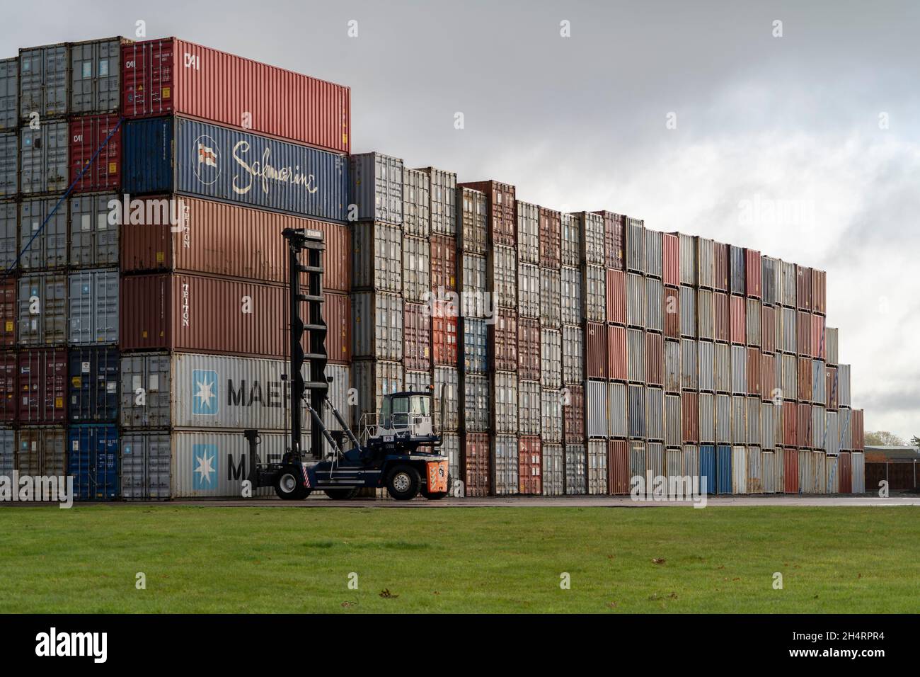 Large stack of shipping containers being stored off dock in Eye ...