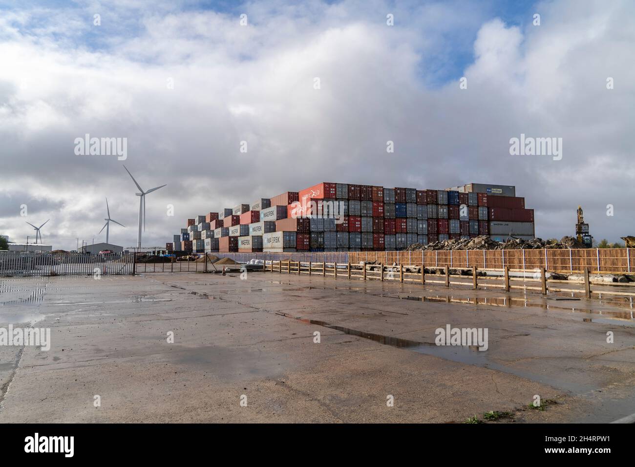 Large stack of shipping containers being stored off dock in Eye ...