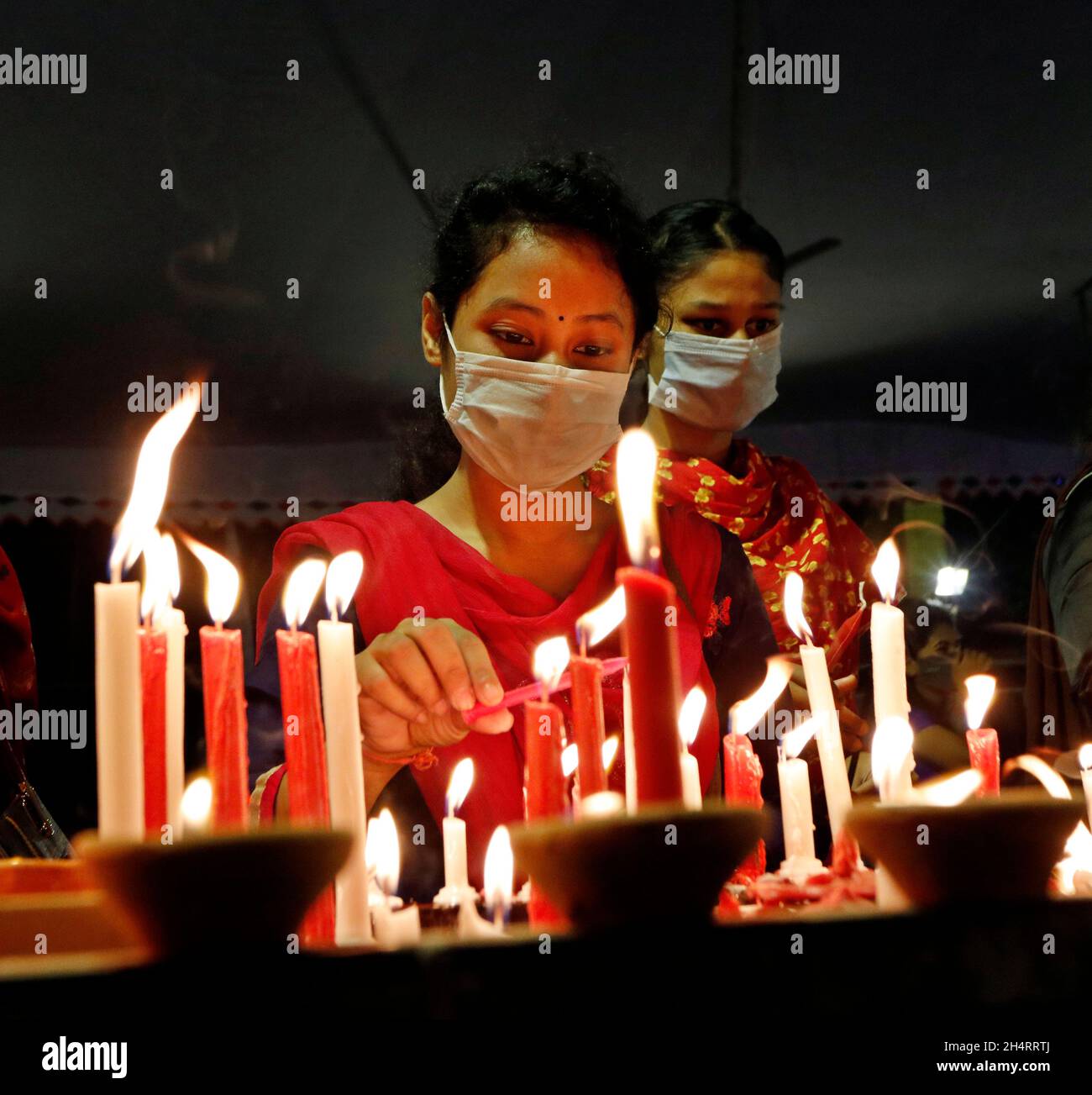 NOVEMBER04,2021,DHAKA-BANGLADESH- Devotees seen lighting candles as ...