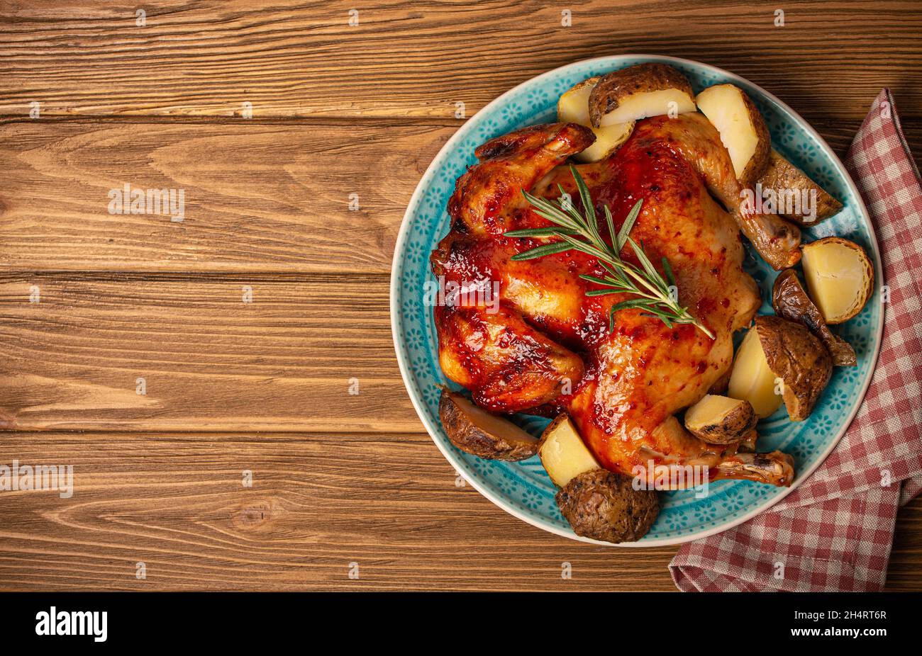 Whole roasted chicken from above copy space Stock Photo - Alamy