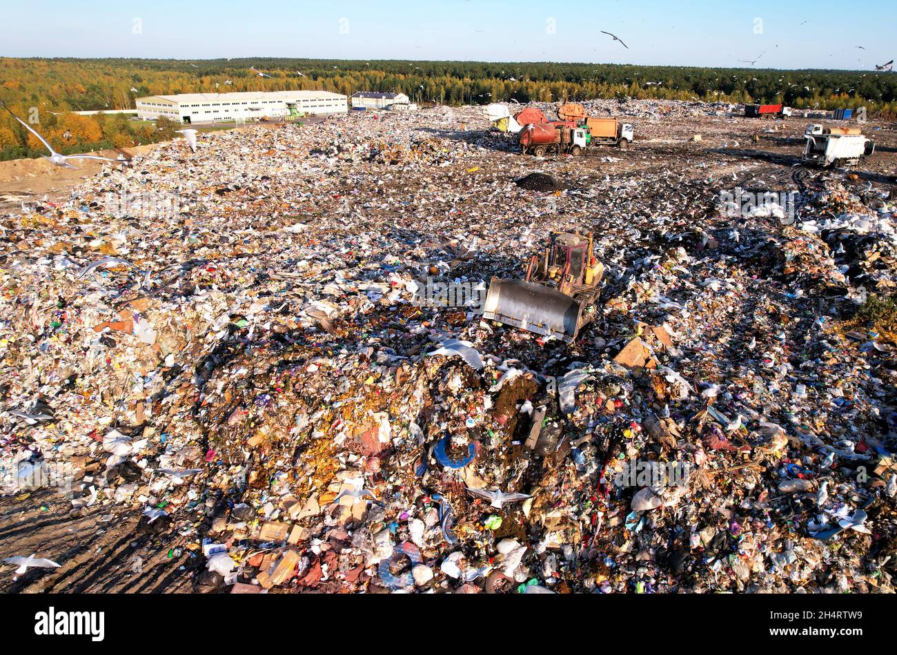Landfill waste disposal. Garbage dump with waste plastic and ...