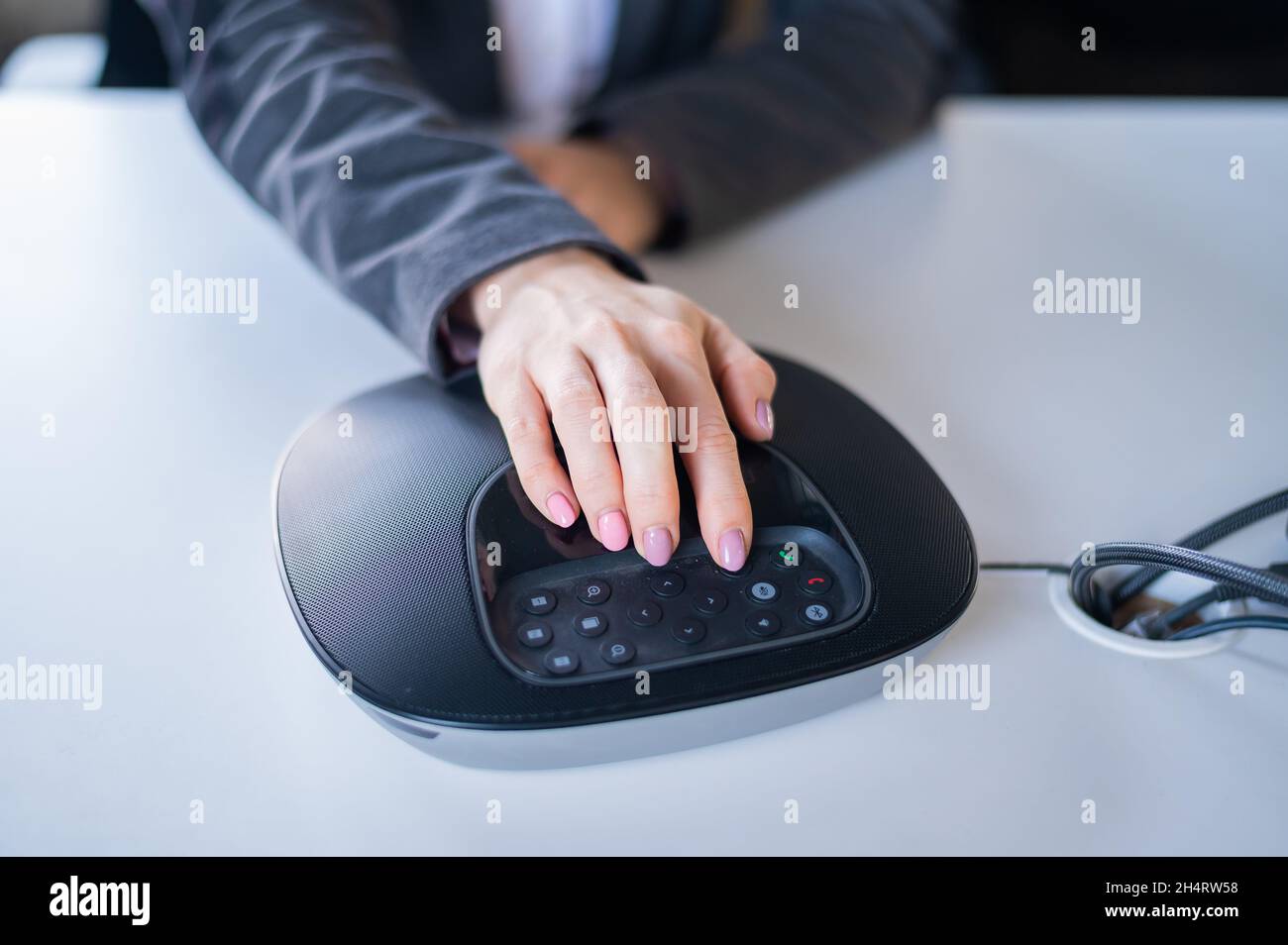 Phone speakerphone conference hi-res stock photography and images - Alamy