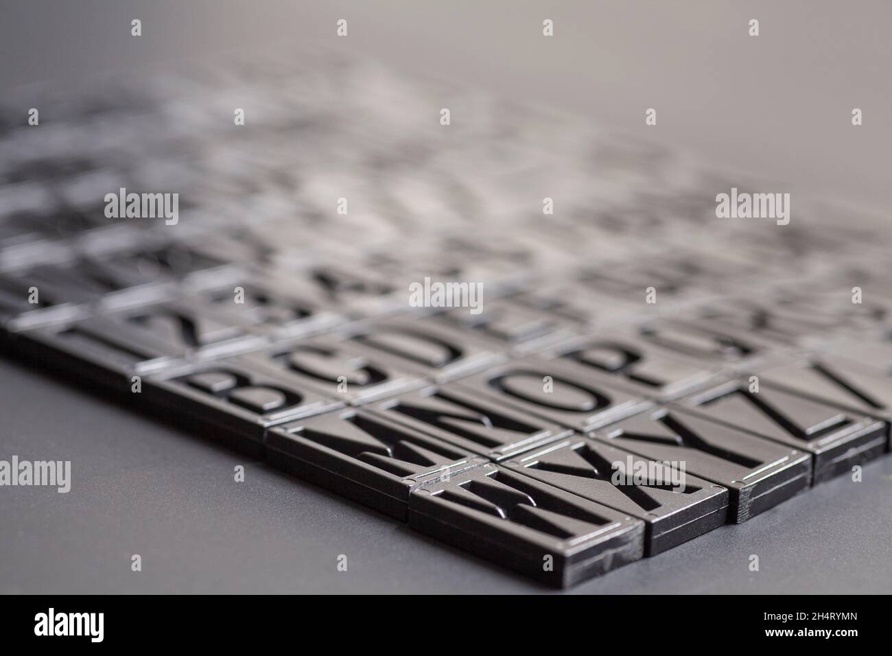 letterpress alphabet and numbers on black background Stock Photo - Alamy