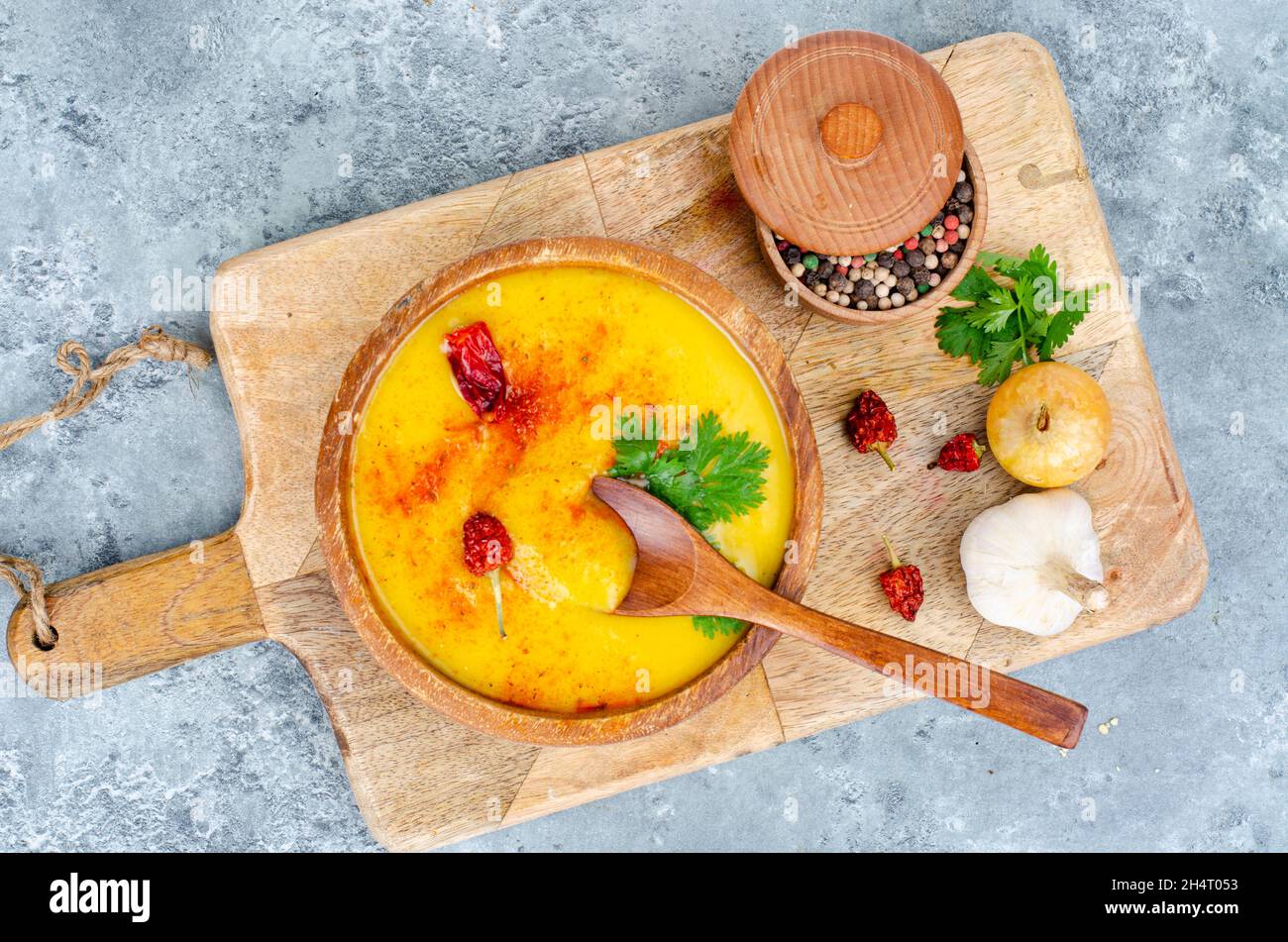 Spicy pumpkin puree soup with curry and saffron. Studio Photo Stock ...