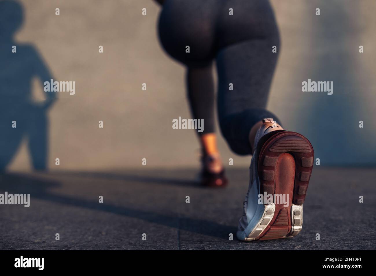 Fitness woman doing lunges exercises for training leg muscles, active ... Fitness woman doing lunges exercises for training leg muscles, active ...