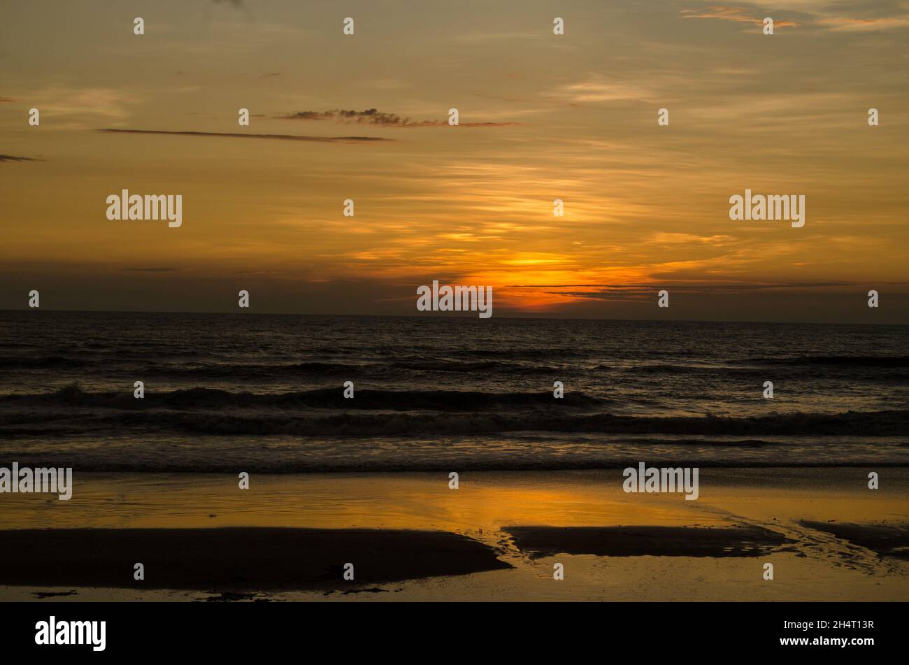 beautiful colorful sunset in Anjuna Beach, Goa Stock Photo - Alamy