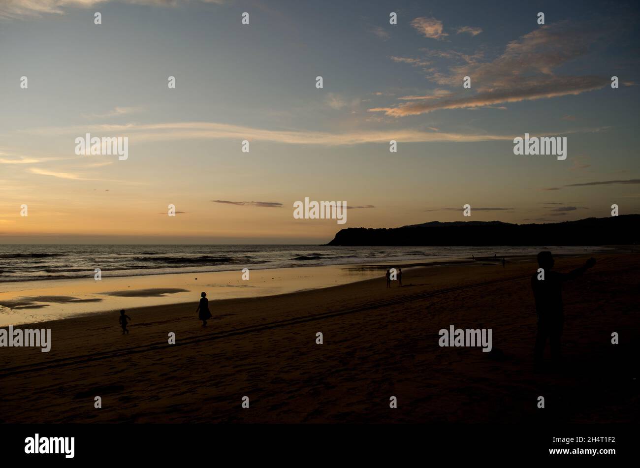 beautiful colorful sunset in Anjuna Beach, Goa Stock Photo - Alamy